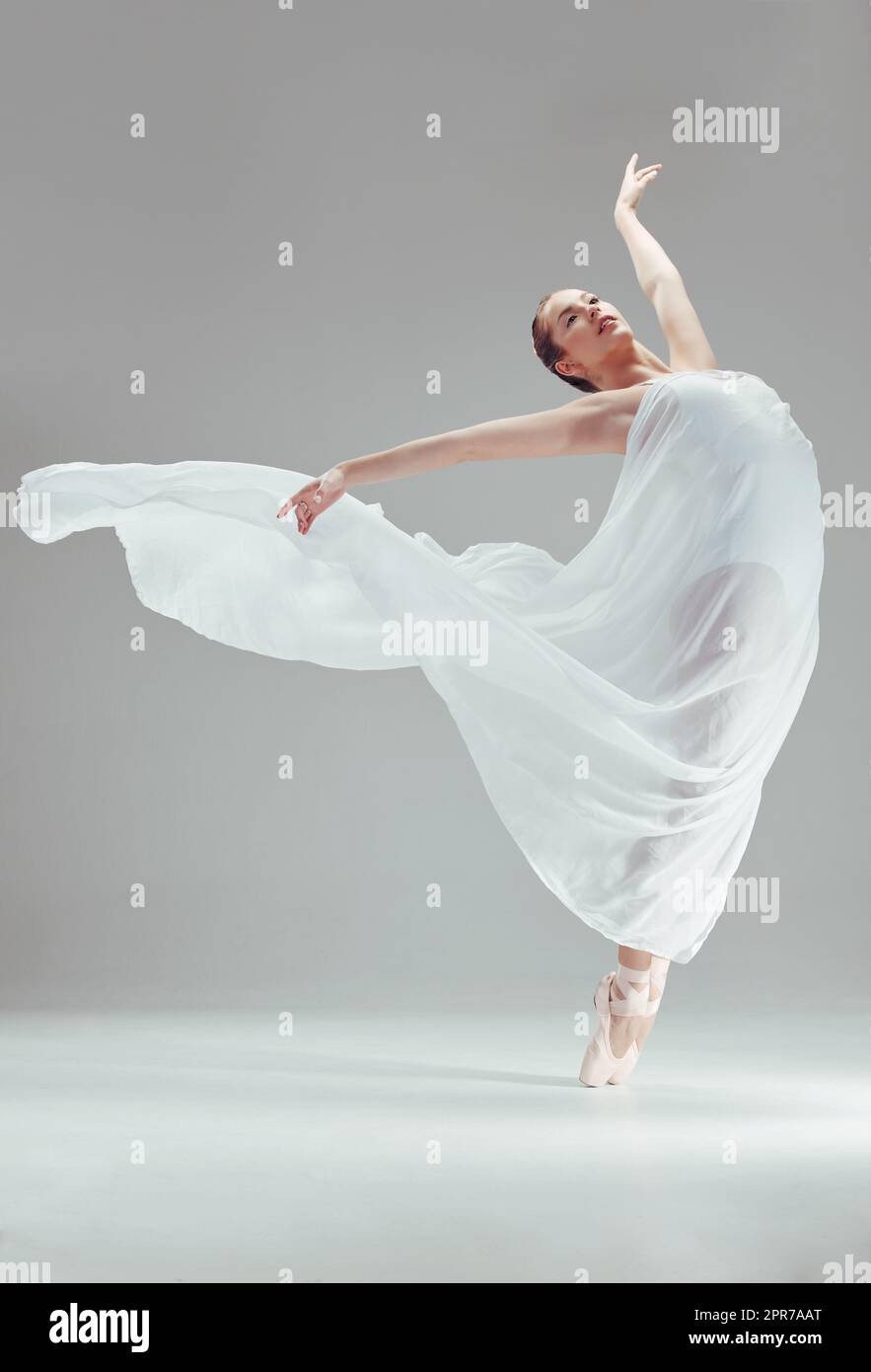 Elegance personified. Full length shot of an attractive young ballerina ...