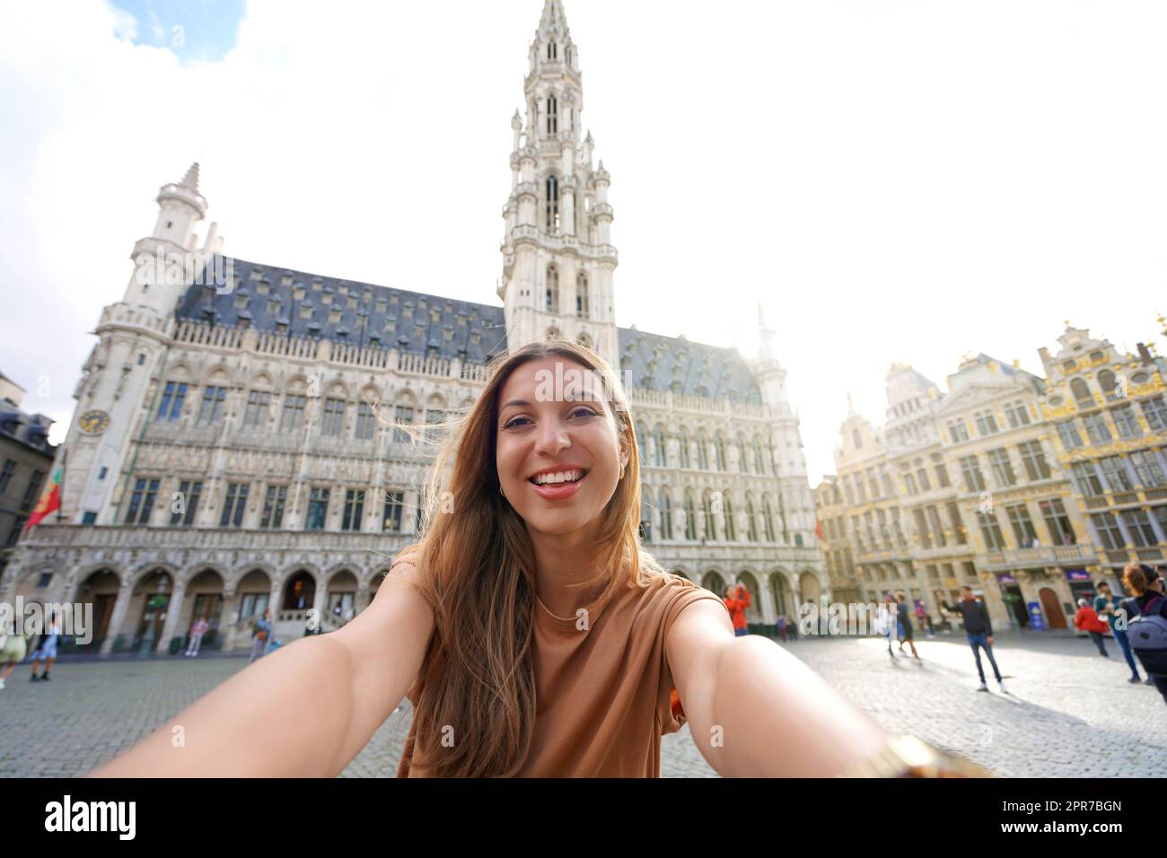 Tourism in Brussels. Self portrait of happy traveler girl have fun in Brussels, Belgium Stock ...