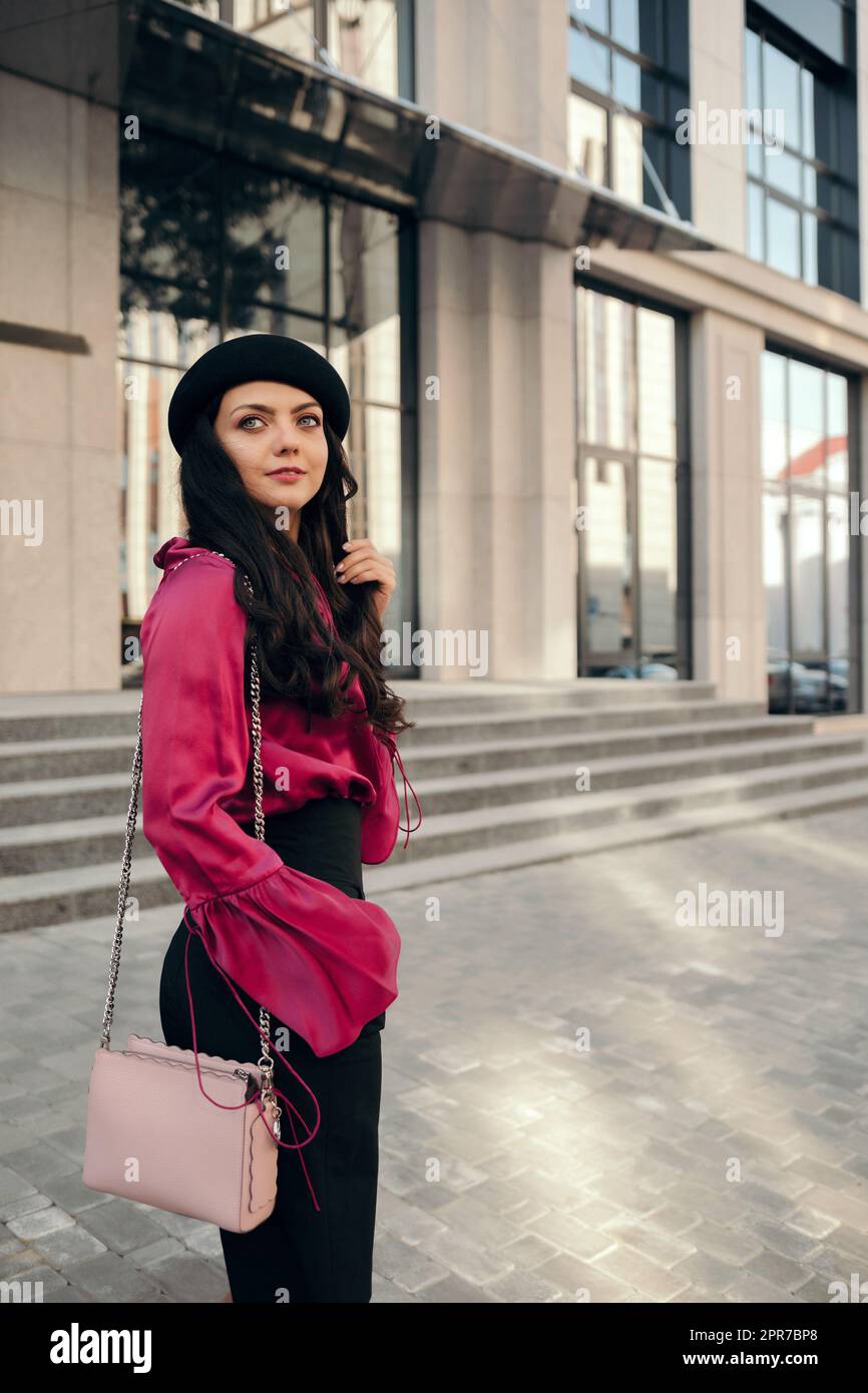 Beautiful woman walking city streets hi-res stock photography and ...