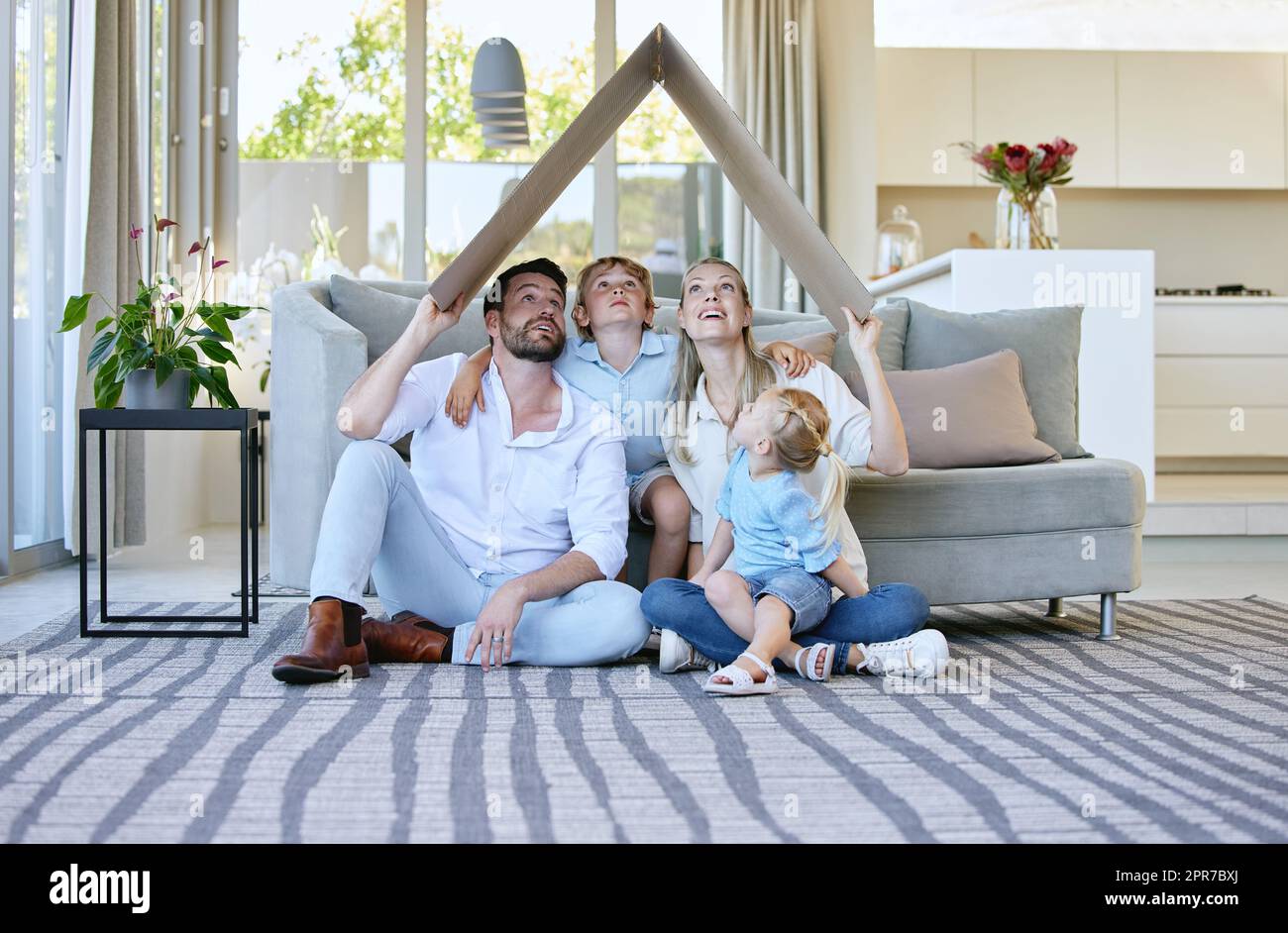 Family roof over heads house hi-res stock photography and images - Alamy