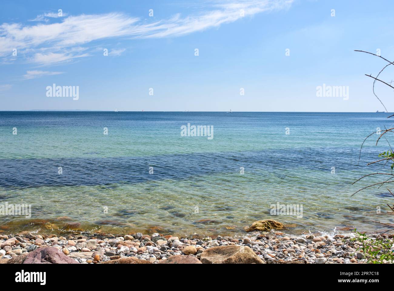 Copy space at the sea with a blue sky background. Calm ocean waves ...
