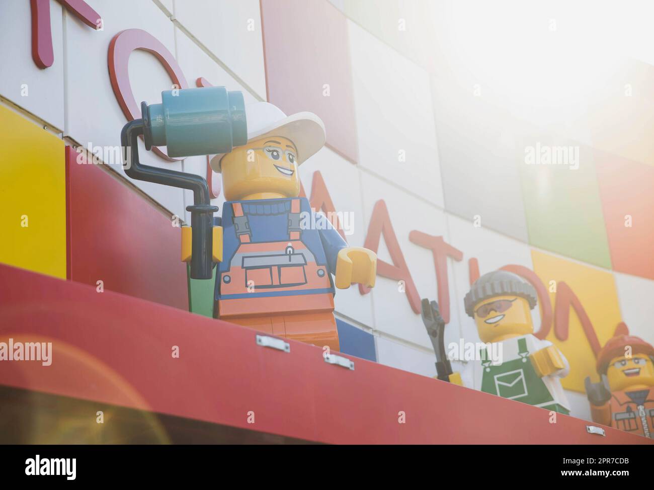 big plastic Lego mans on the roof of gift shop in Legoland in Denmark ...