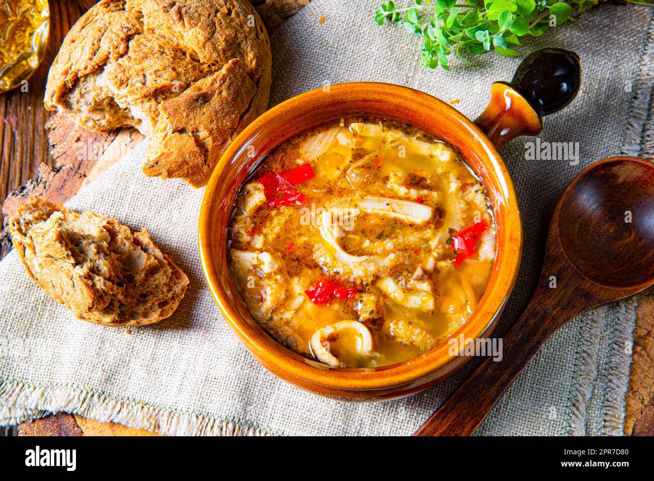 Spicy tripe soup with red paprika Stock Photo - Alamy