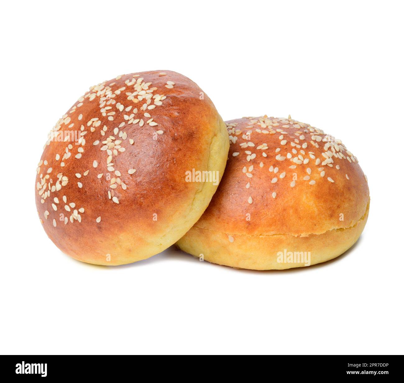 Whole round bun made of white wheat flour with sesame seeds isolated on ...