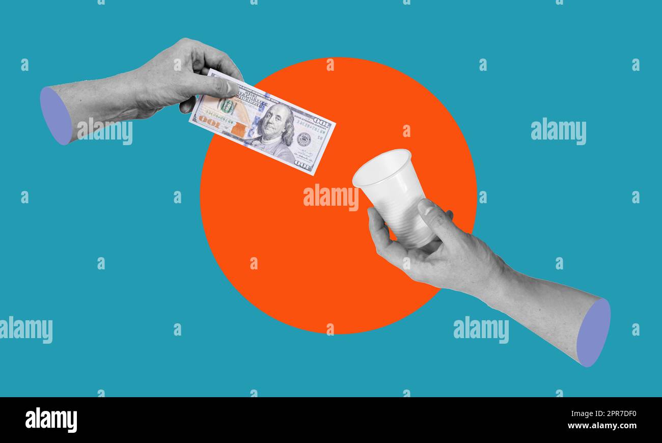 A woman's hand holding a hundred-dollar bill of money passes it to ...