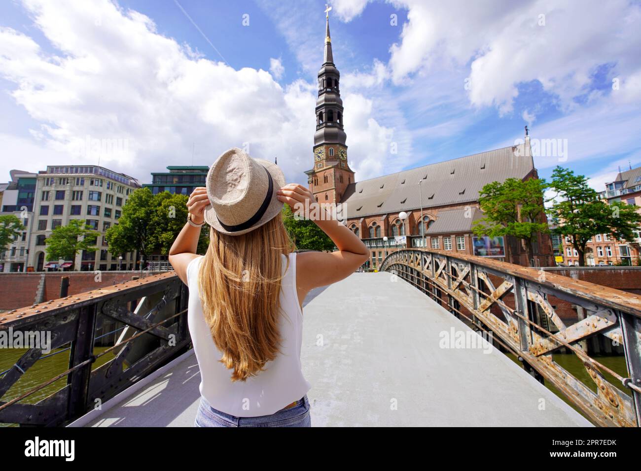 Tourist girl walks on old bridge in Hamburg City, Germany Stock Photo ...
