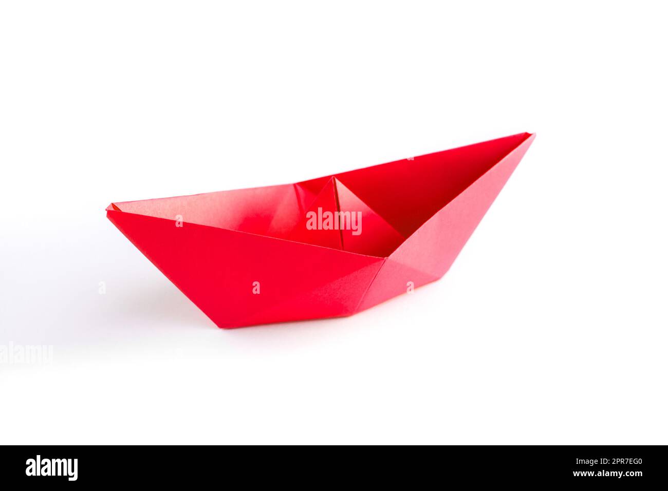Red paper boat origami isolated on a white background Stock Photo - Alamy