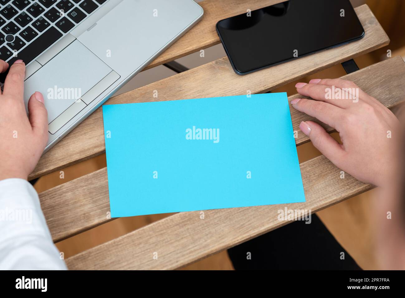 Woman Typing On Lap Top Keyboard, Presenting Important Message On Paper ...