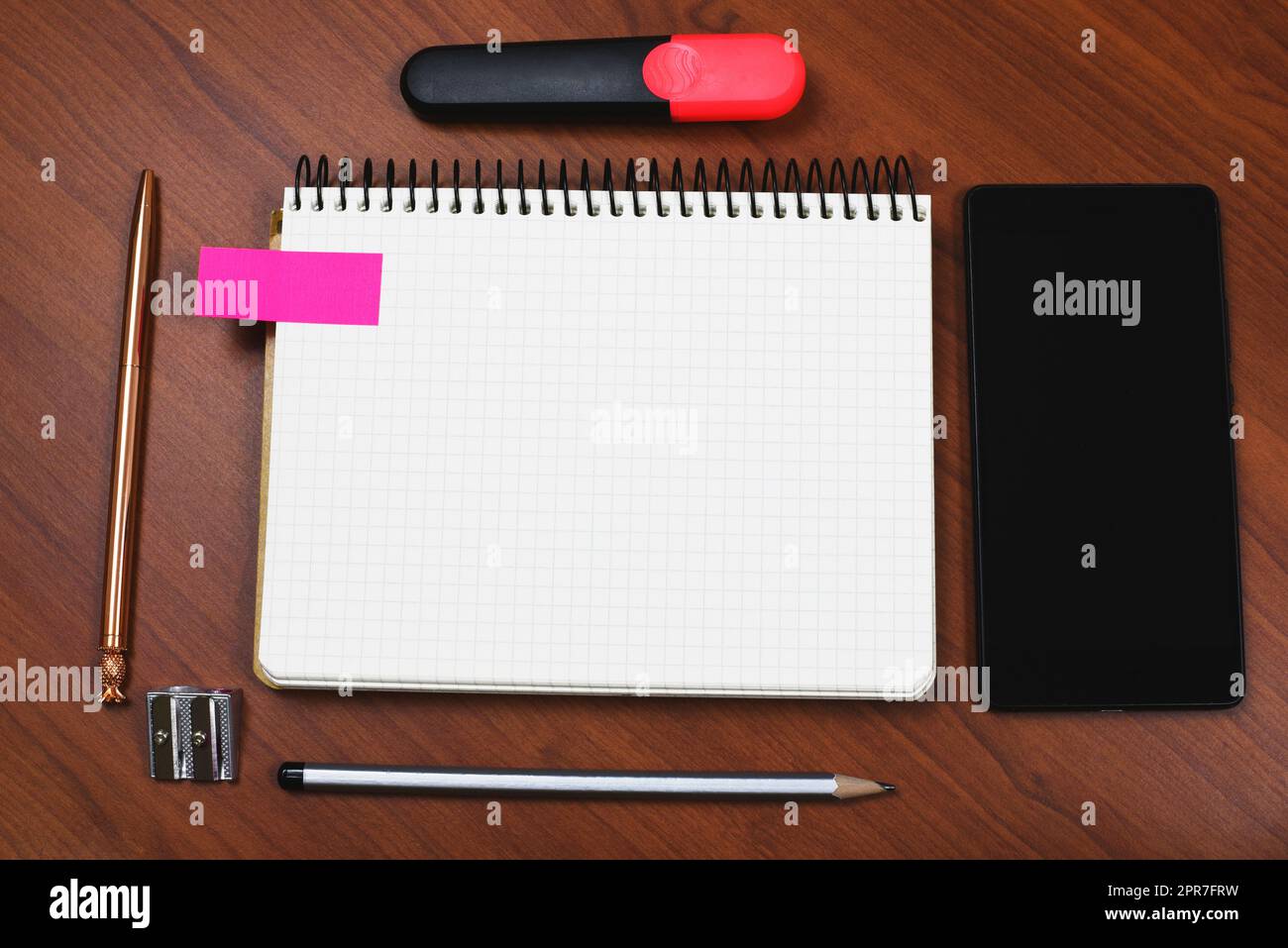 Notebook With Important Message On Desk With Pen, Pencil, Sharpener ...