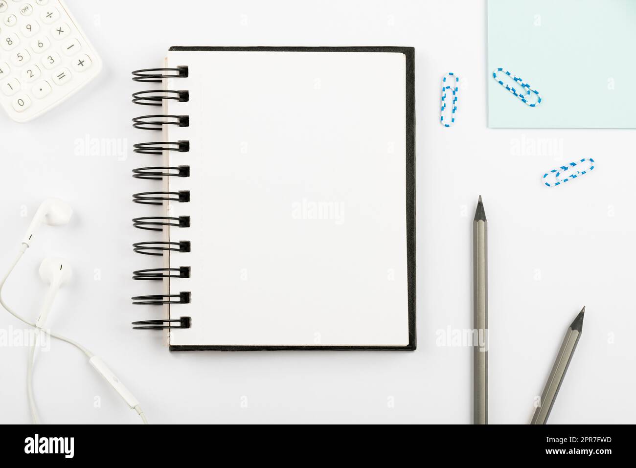 Notebook With Important Message On Desk With Pens, Calculator ...