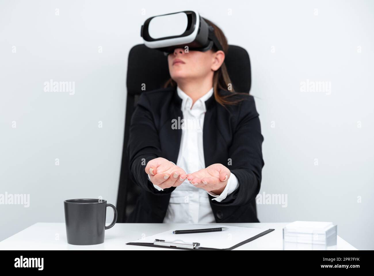 Female Executive Gesturing While Learning Professional Skill Through ...