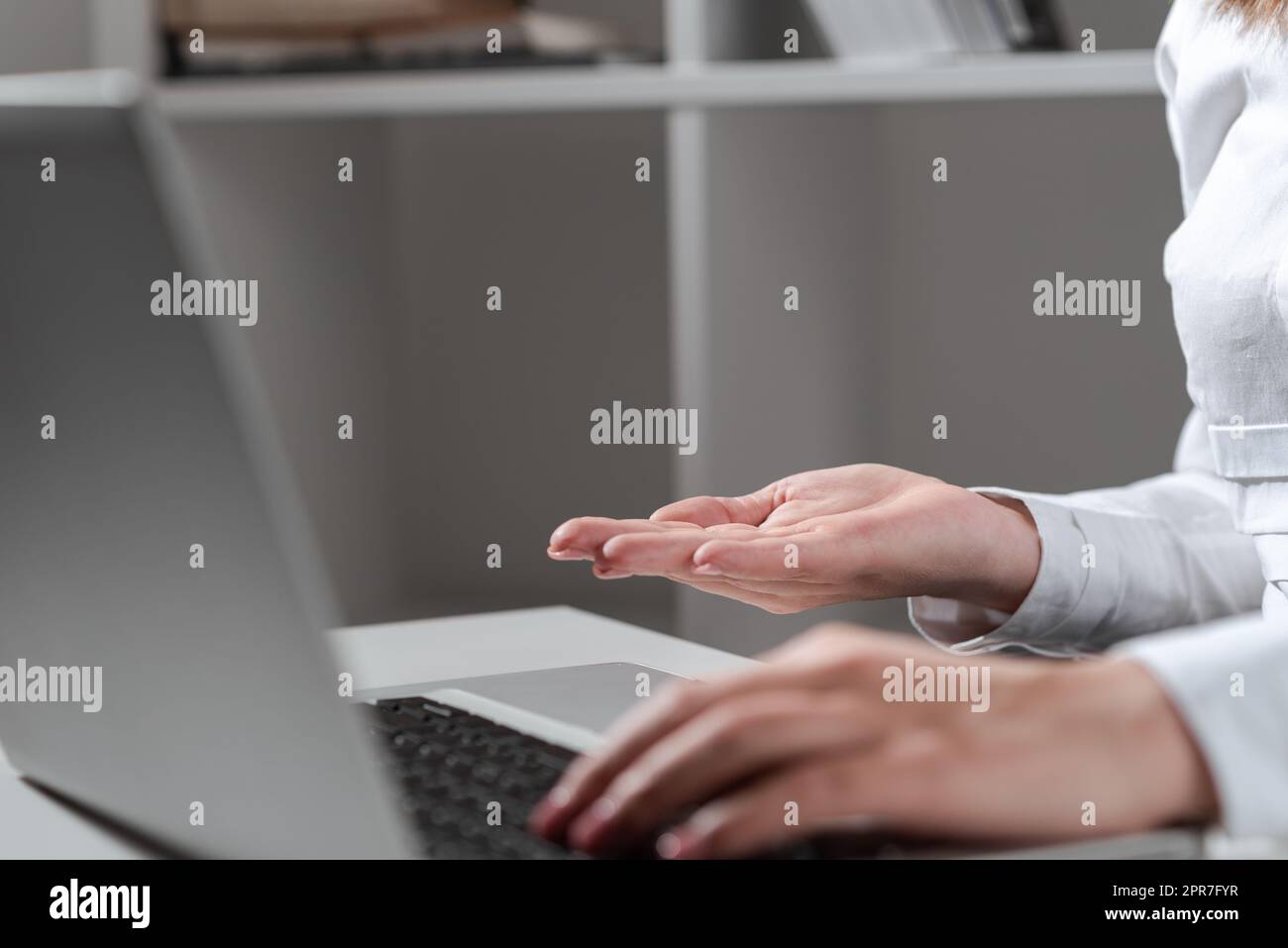 Businesswoman Typing Recent Update On Lap Top Keyboard On Desk And ...
