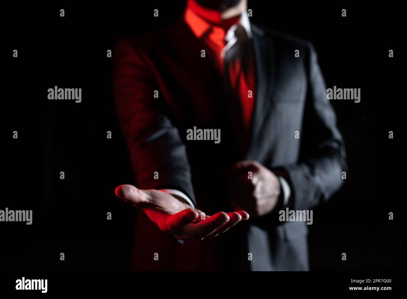 Businessman Holding Important Message In One Hand. Man In Suit Showing ...