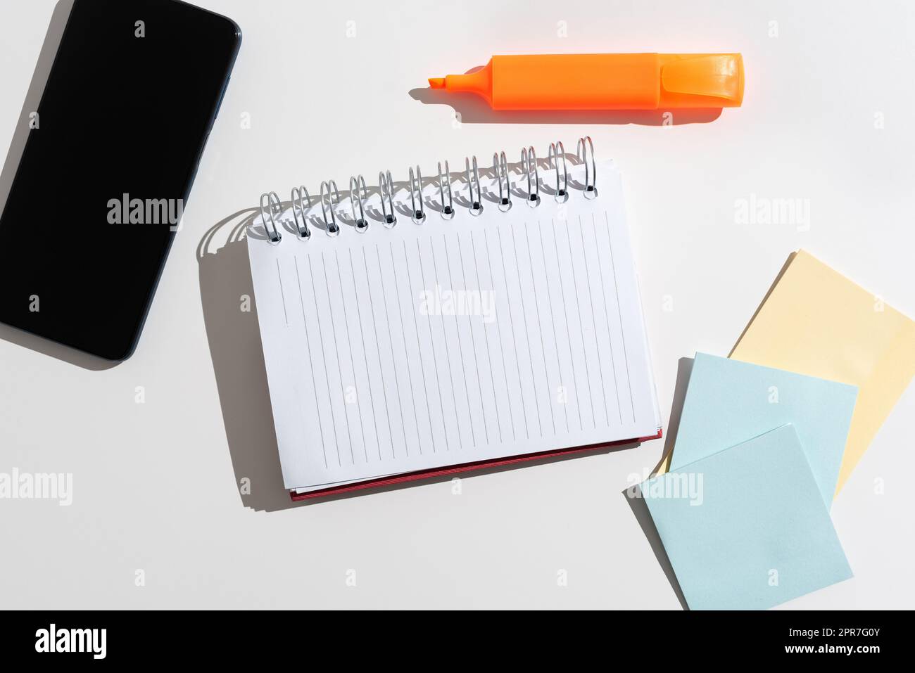 Notebook With Important Message Surrounded With Cellphone, Marker And ...