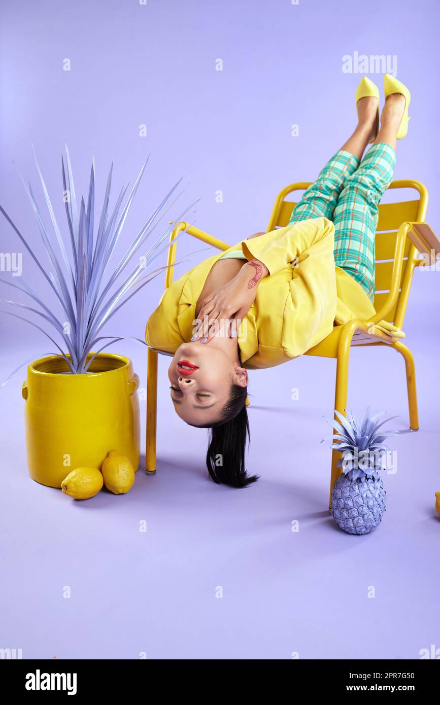 Chair upside down woman hi-res stock photography and images - Alamy