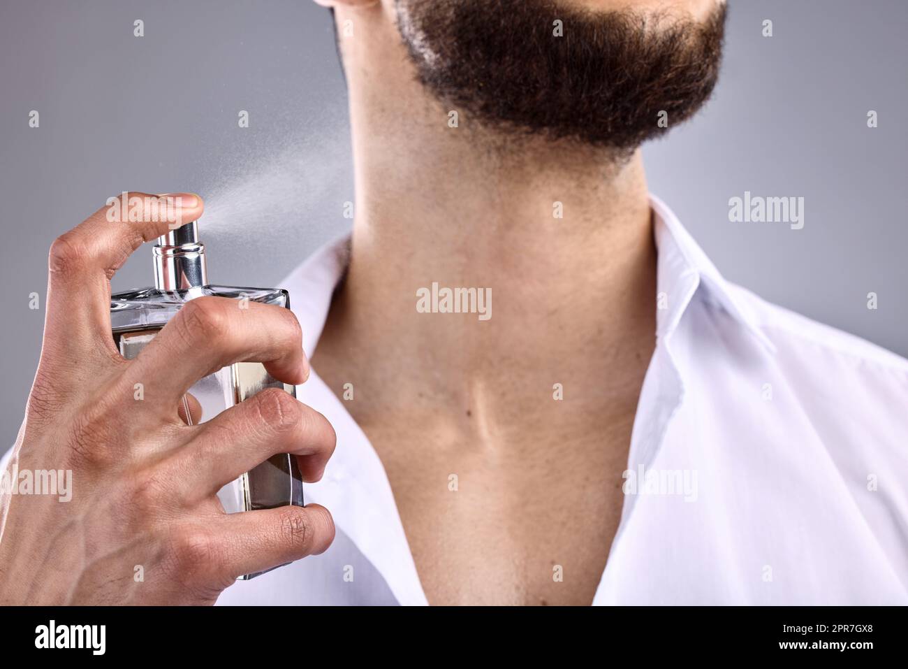Man spraying perfume hi-res stock photography and images - Alamy