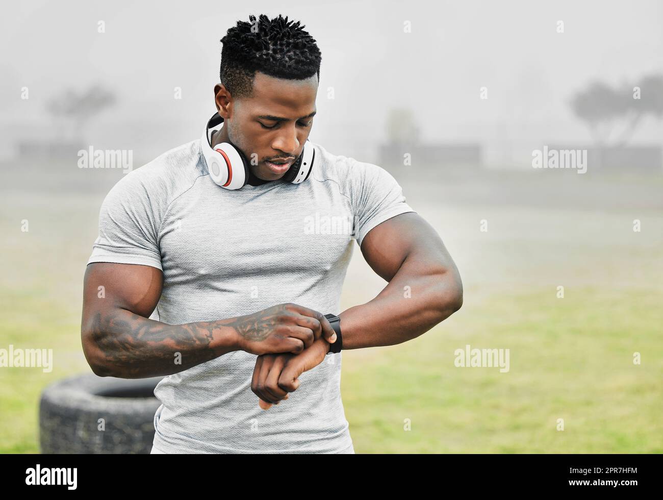 How was that for time. a handsome young male athlete checking his ...