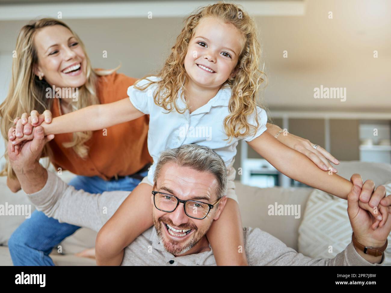 Family playing games hi-res stock photography and images - Alamy