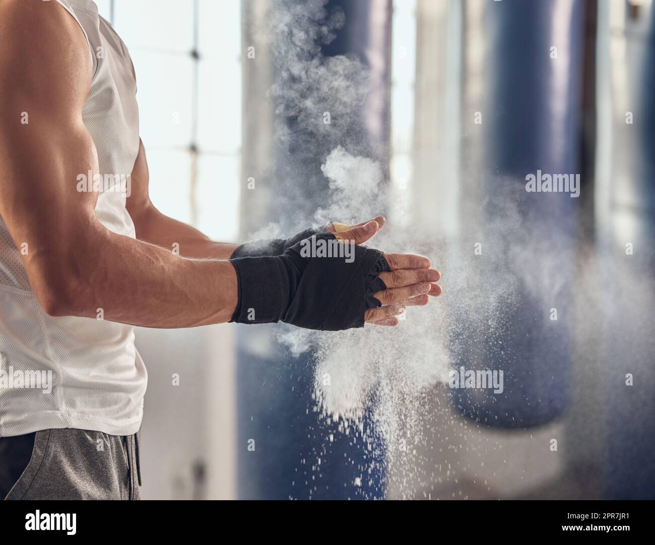 Mma fighter prepare for boxing routine. Combat using chalk to prepare ...