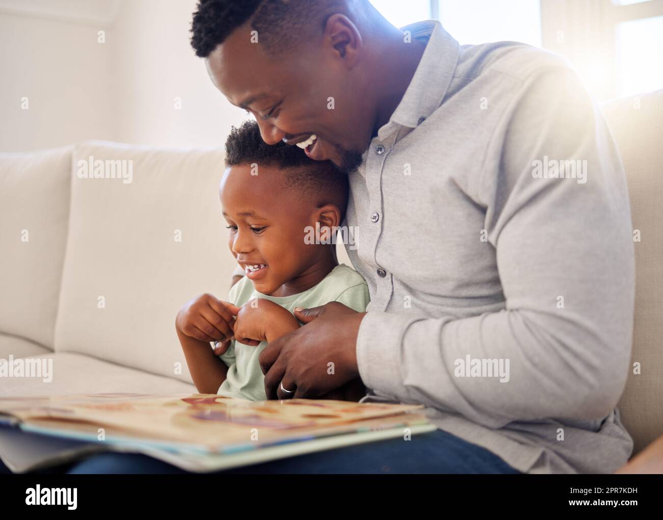 African boy reading book hi-res stock photography and images - Alamy