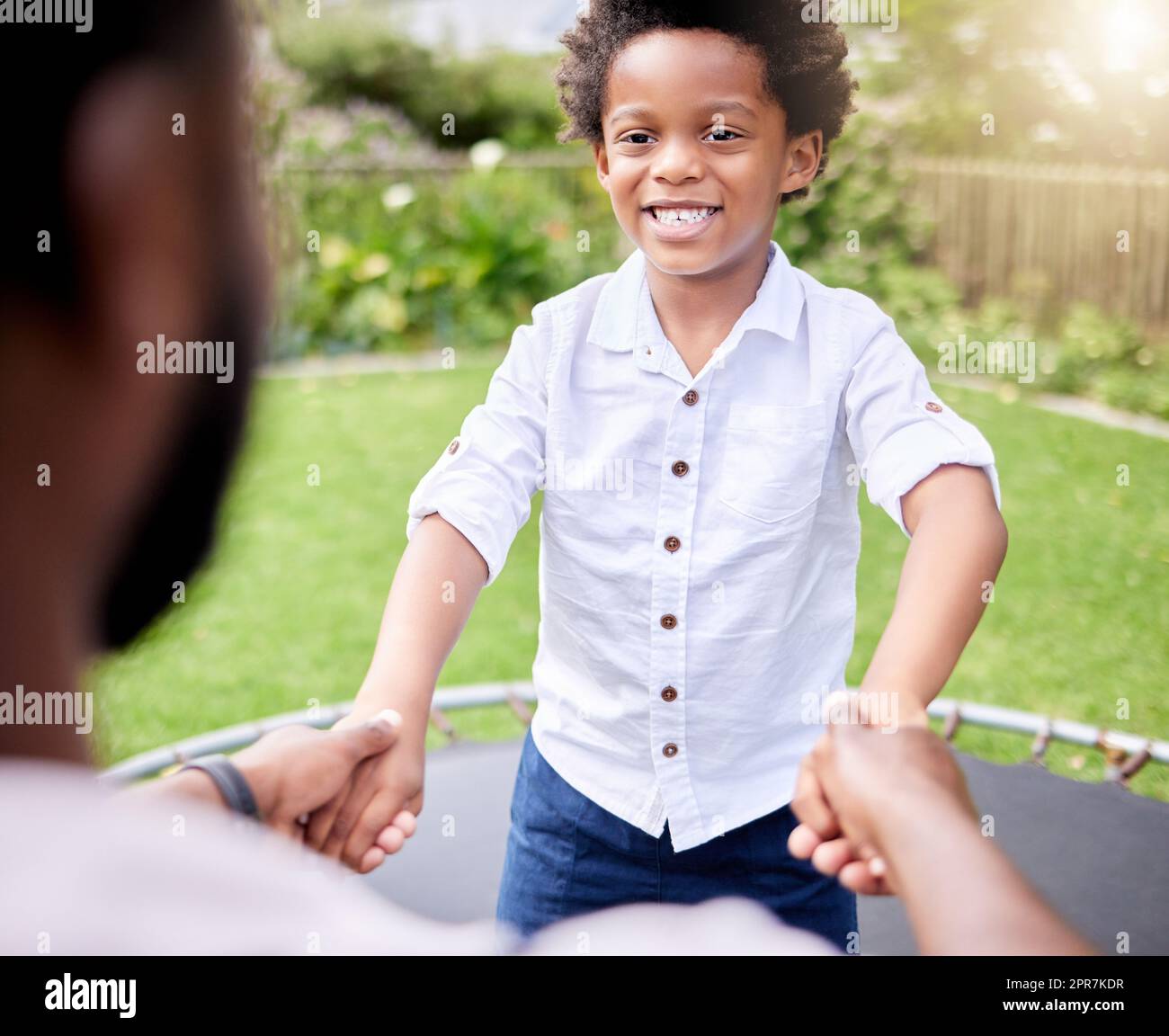 Im ready for some big jumps now. a little boy jumping on a trampoline ...
