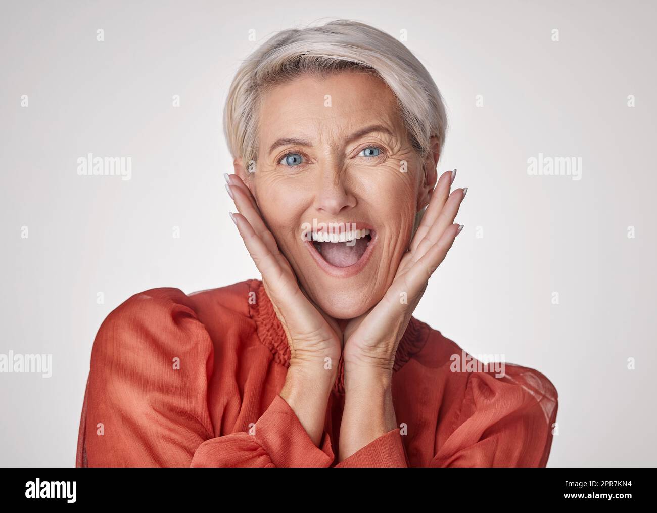 Portrait of one beautiful caucasian mature woman isolated against a ...