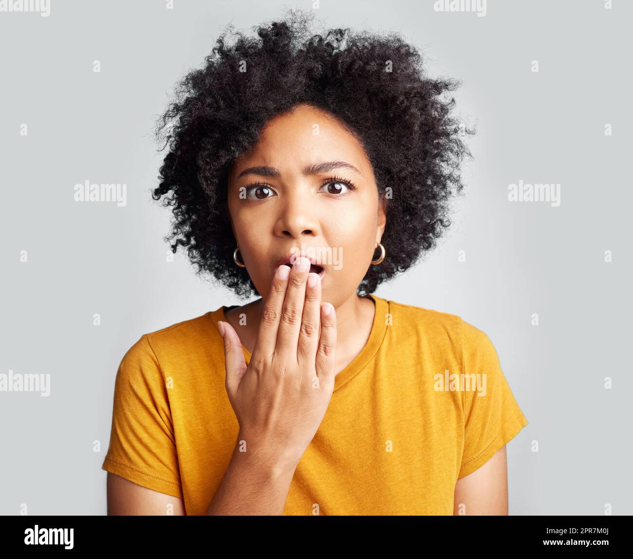 I dont know if I can keep a secret like this. a young woman looking ...