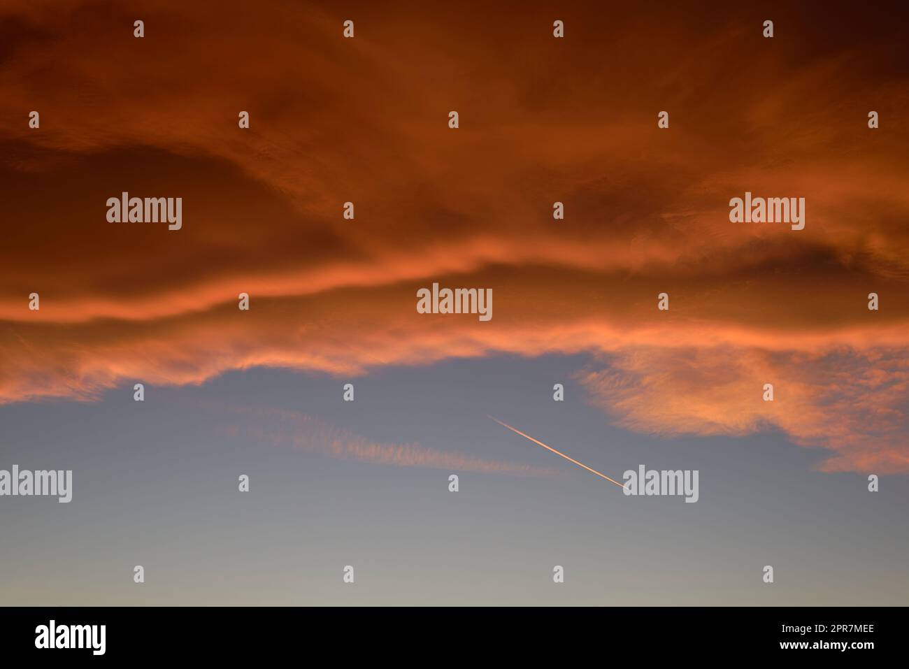 A Sky light after sunset. orange background Stock Photo - Alamy