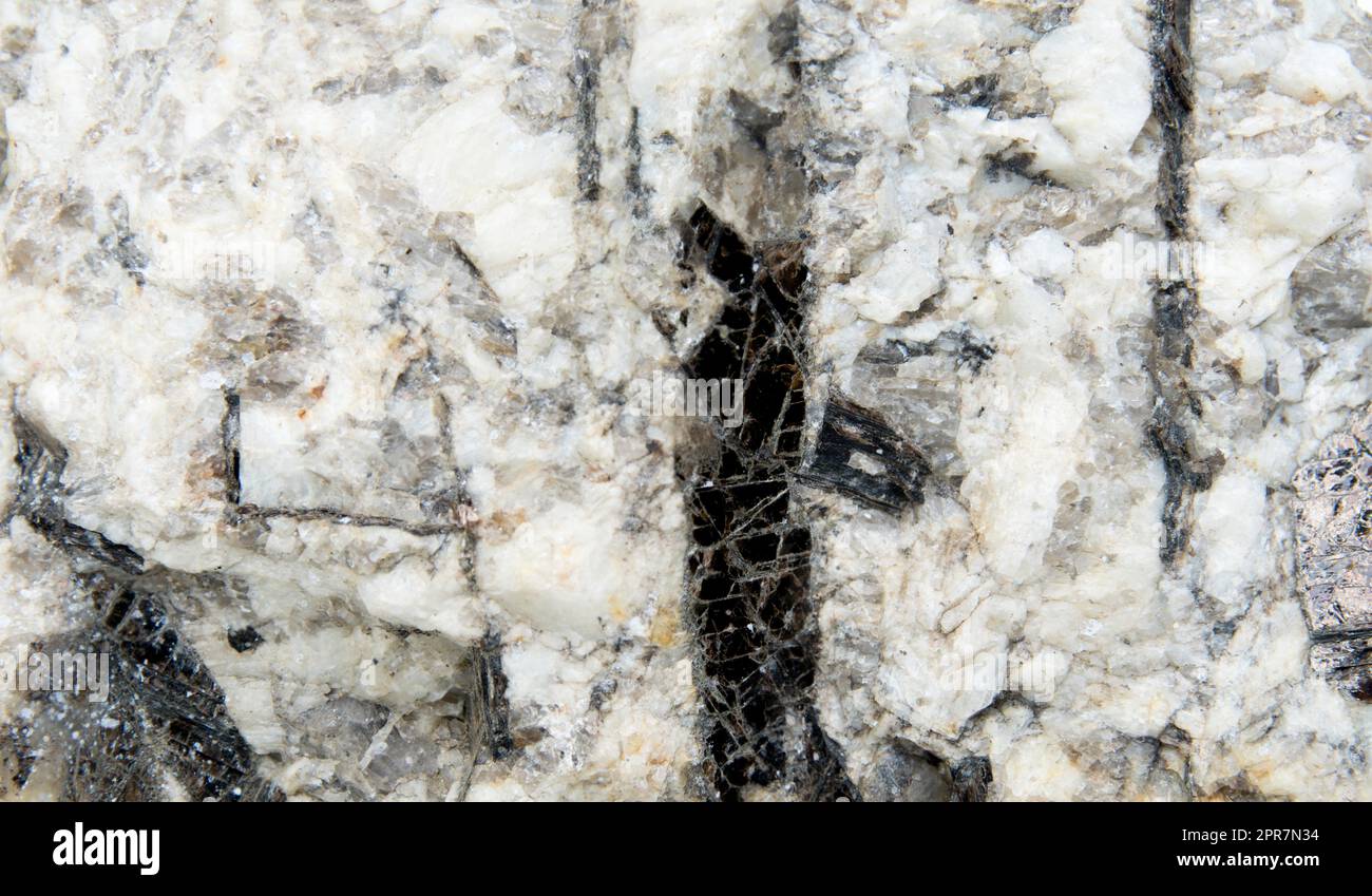 biotite mineral in a rock over white background Stock Photo - Alamy