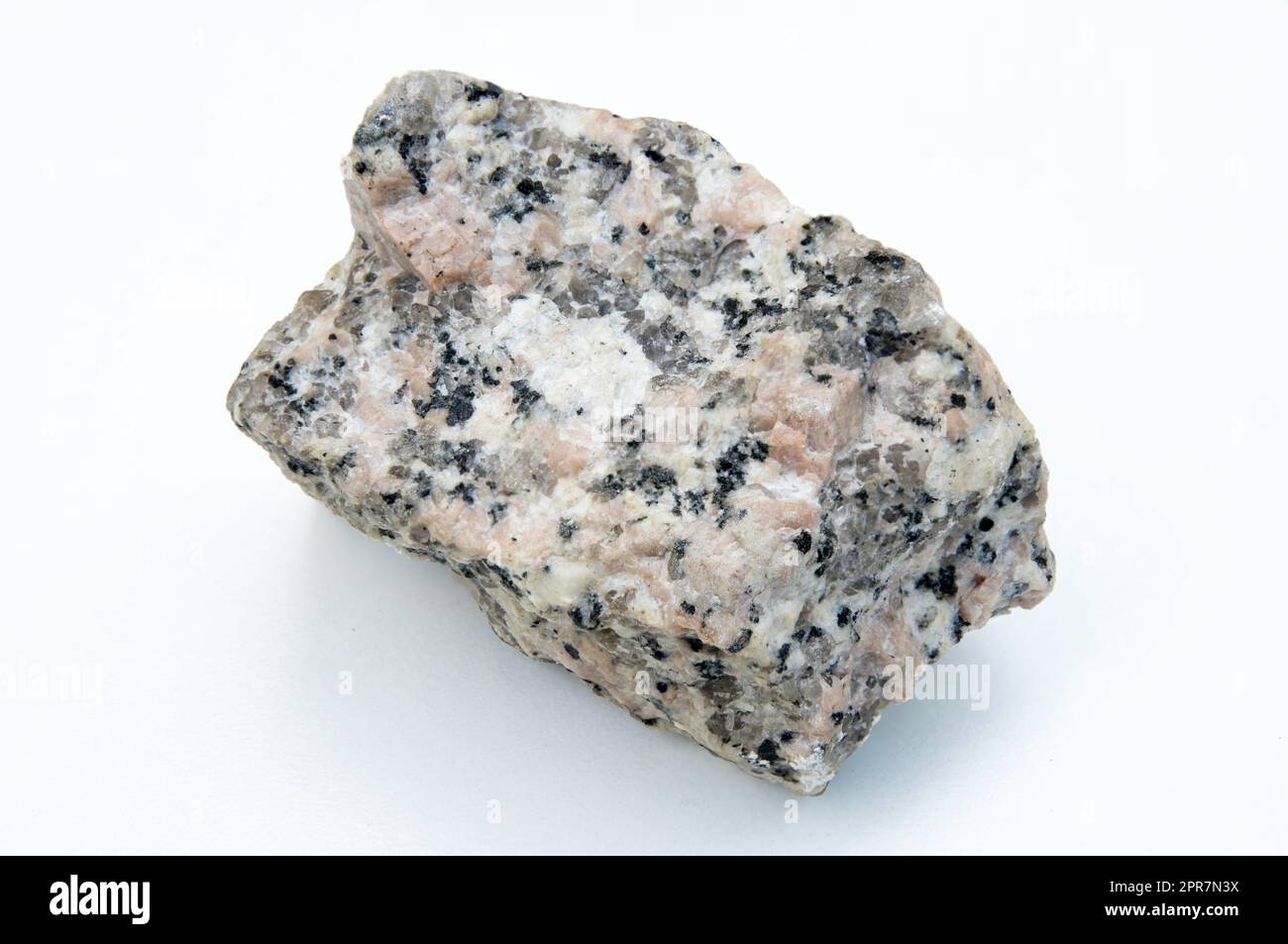 granite igneous rock over white background Stock Photo - Alamy