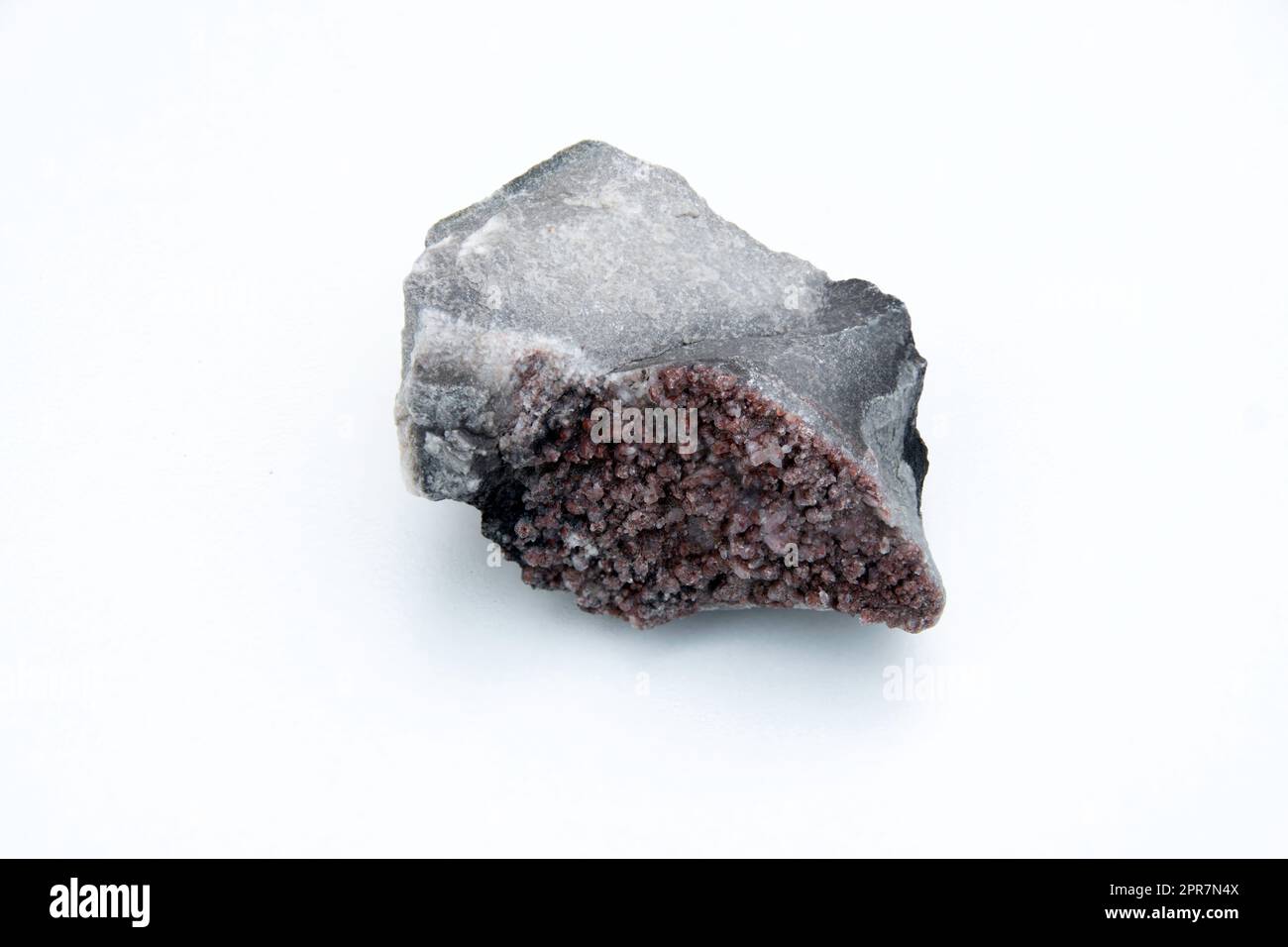 calcite on a rock over white background Stock Photo - Alamy