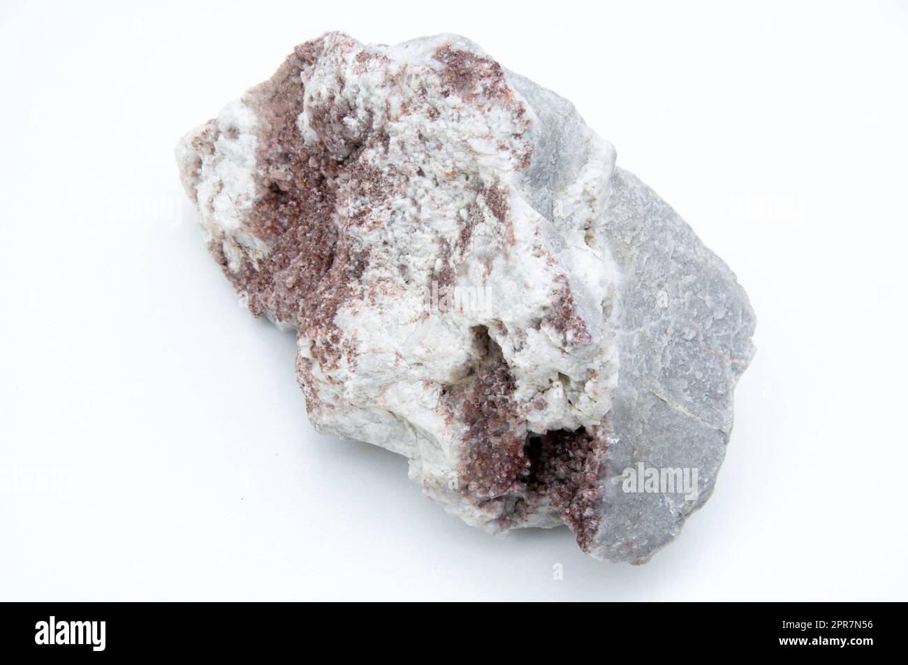 calcite on a rock over white background Stock Photo - Alamy