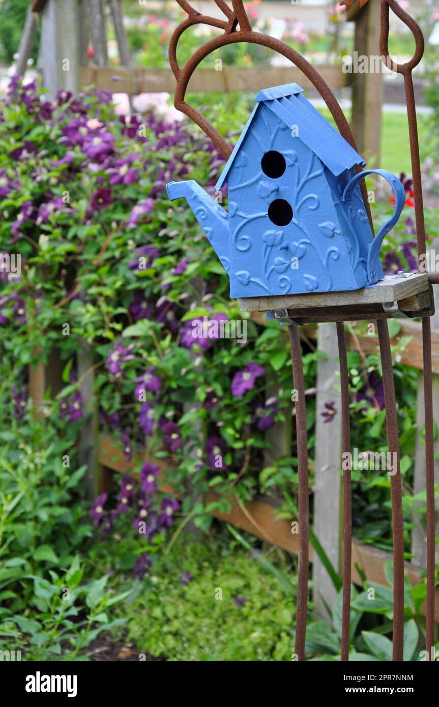 Decorative blue birdhouse Stock Photo - Alamy