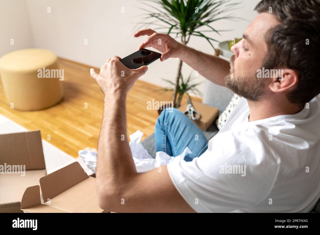 Man unboxing hi-res stock photography and images - Alamy