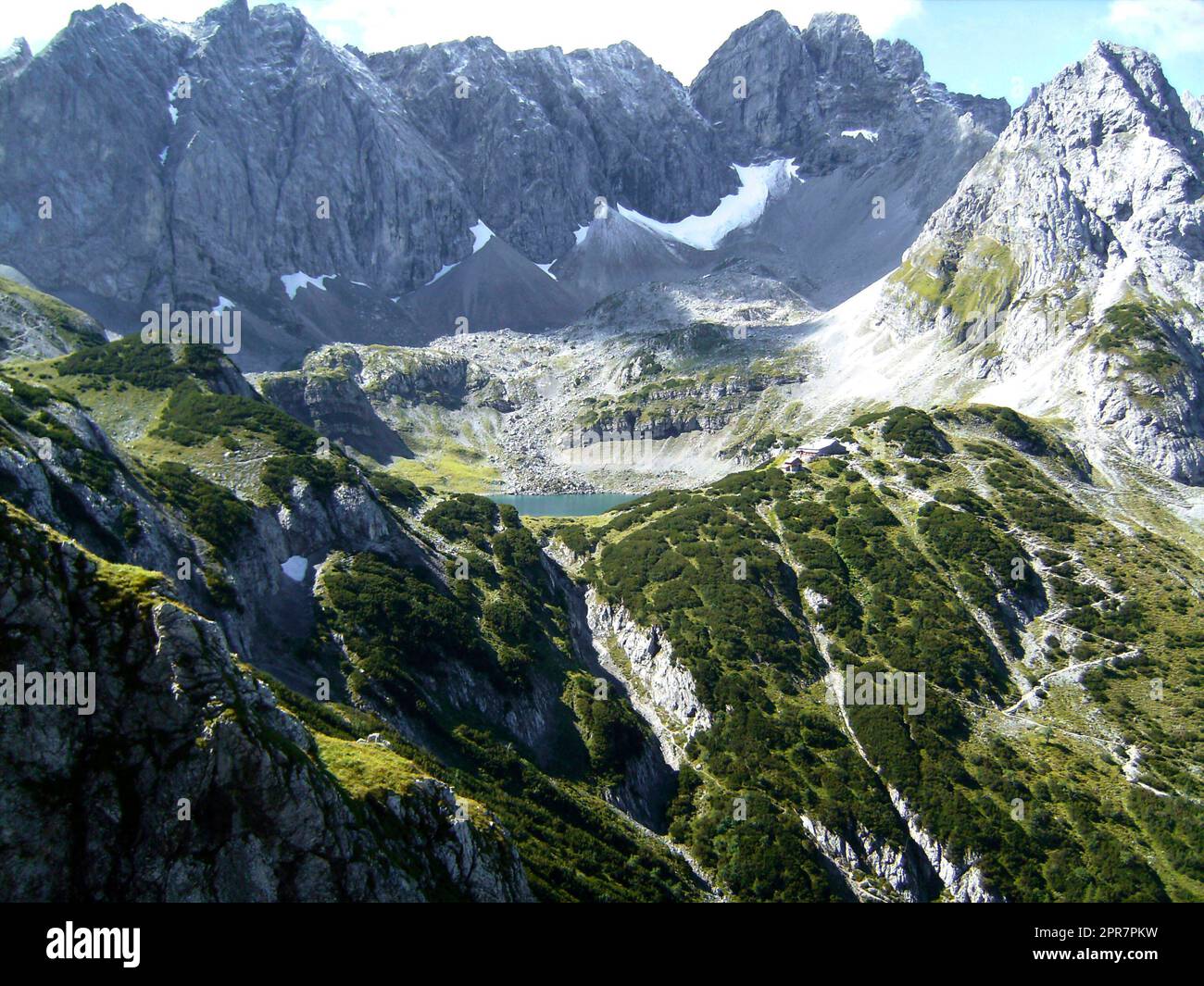 Via ferrata at high mountain lake Seebensee, Tajakopf mountain, Tyrol ...
