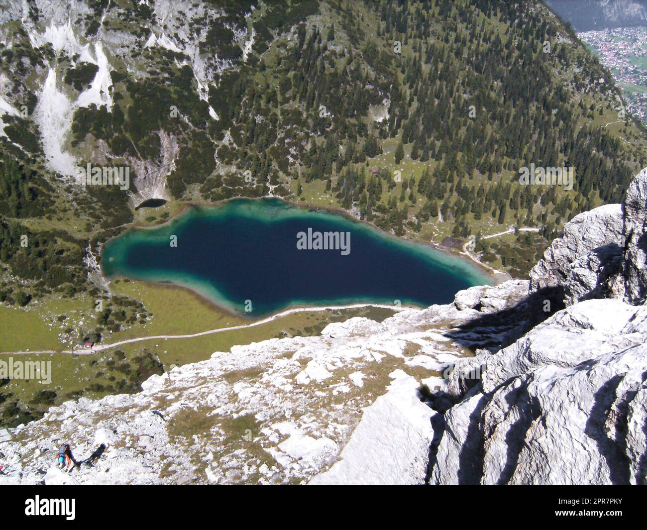 Via ferrata at high mountain lake Seebensee, Tajakante, Tyrol, Austria ...