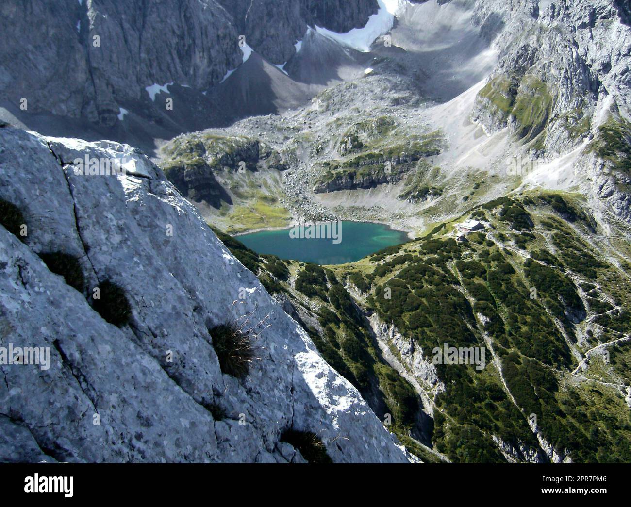 Via ferrata at high mountain lake Drachensee, Tajakante, Tyrol, Austria ...