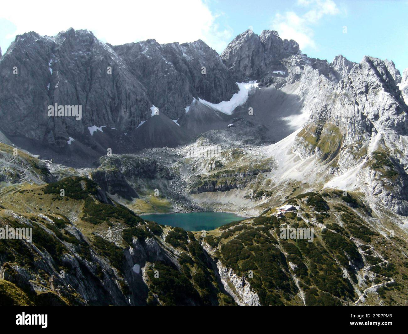 Via ferrata at high mountain lake Drachensee, Tajakante, Tyrol, Austria ...