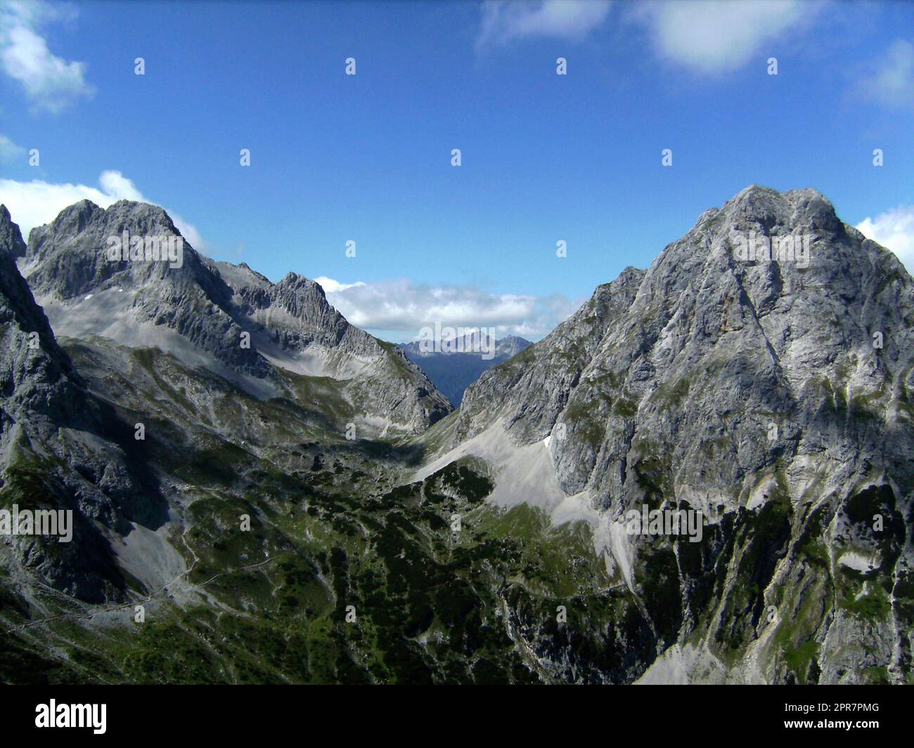 Via ferrata at high mountain lake Seebensee, Tajakopf mountain, Tyrol ...