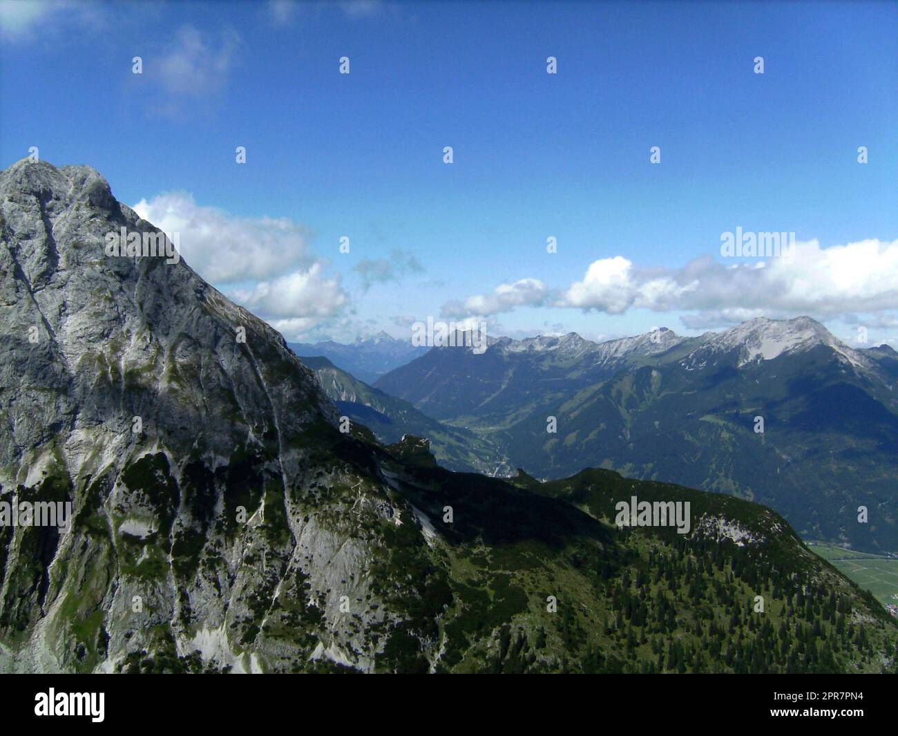 Via ferrata at high mountain lake Seebensee, Tajakopf mountain, Tyrol ...