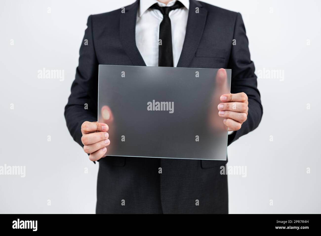 Male Professional Holding Blank Placard And Displaying Business Data ...