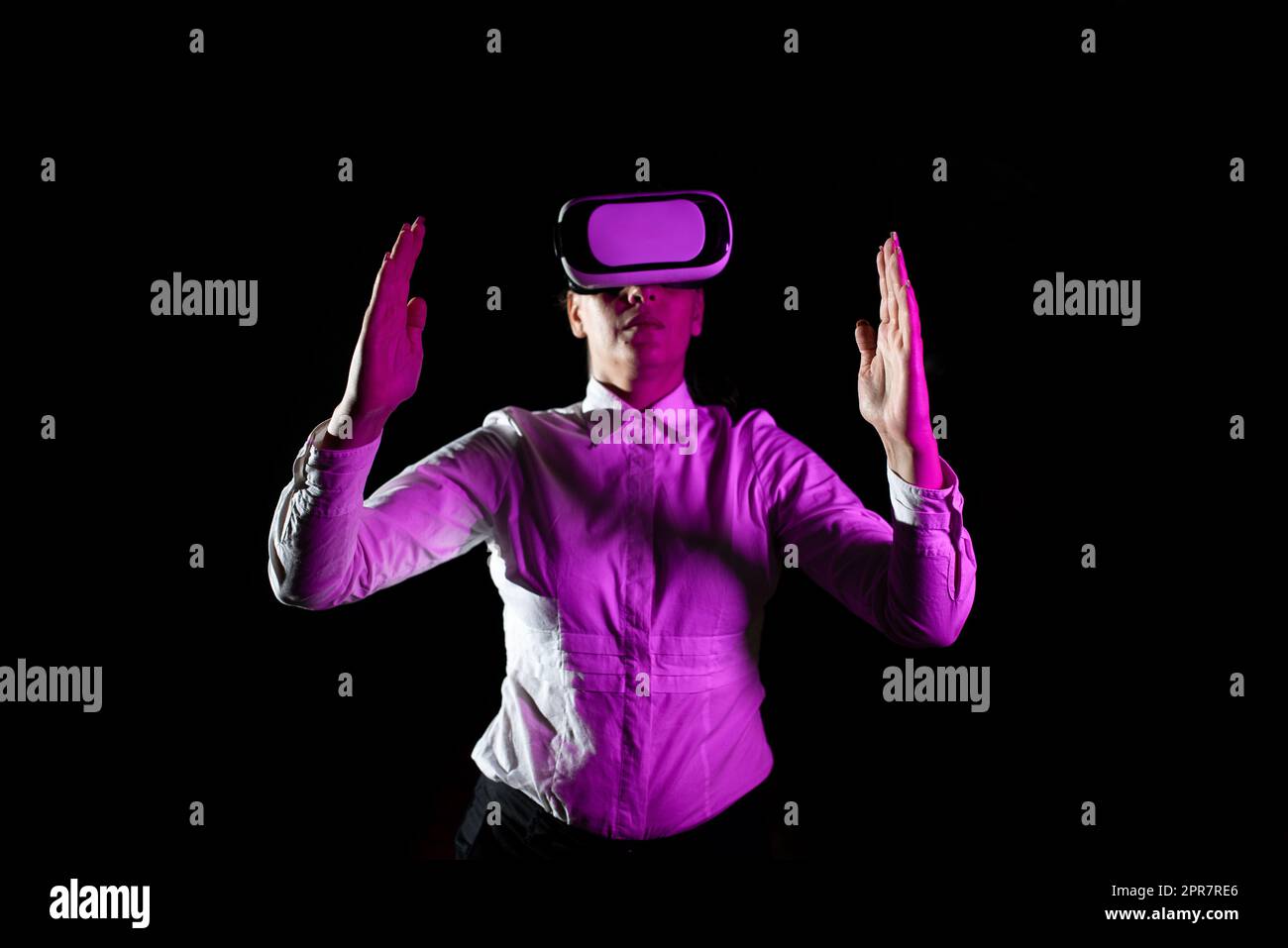 Businesswoman Using Virtual Reality Goggles Gesturing While Taking ...
