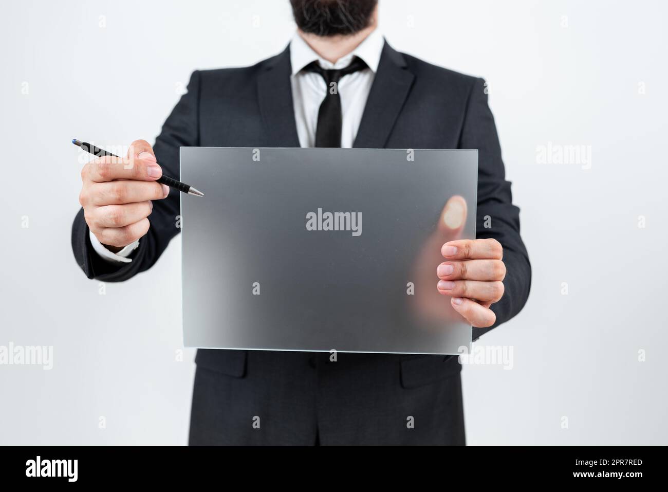 Male Professional Holding Blank Placard And Pen And Displaying Business ...
