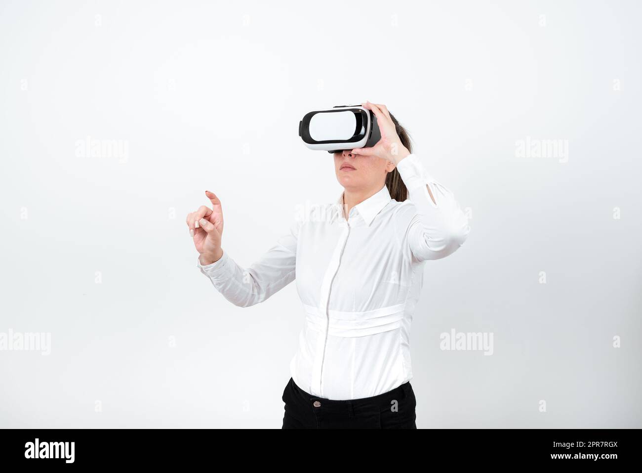 Woman Wearing Vr Glasses And Pointing On Important Messages With One ...