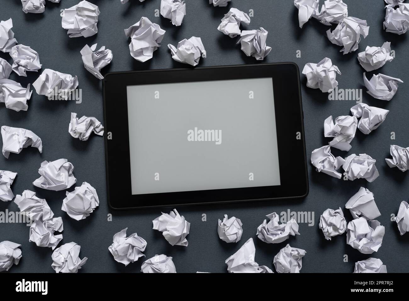 Tablet Screen With Important Message On It Surrounded With Paper Wraps ...