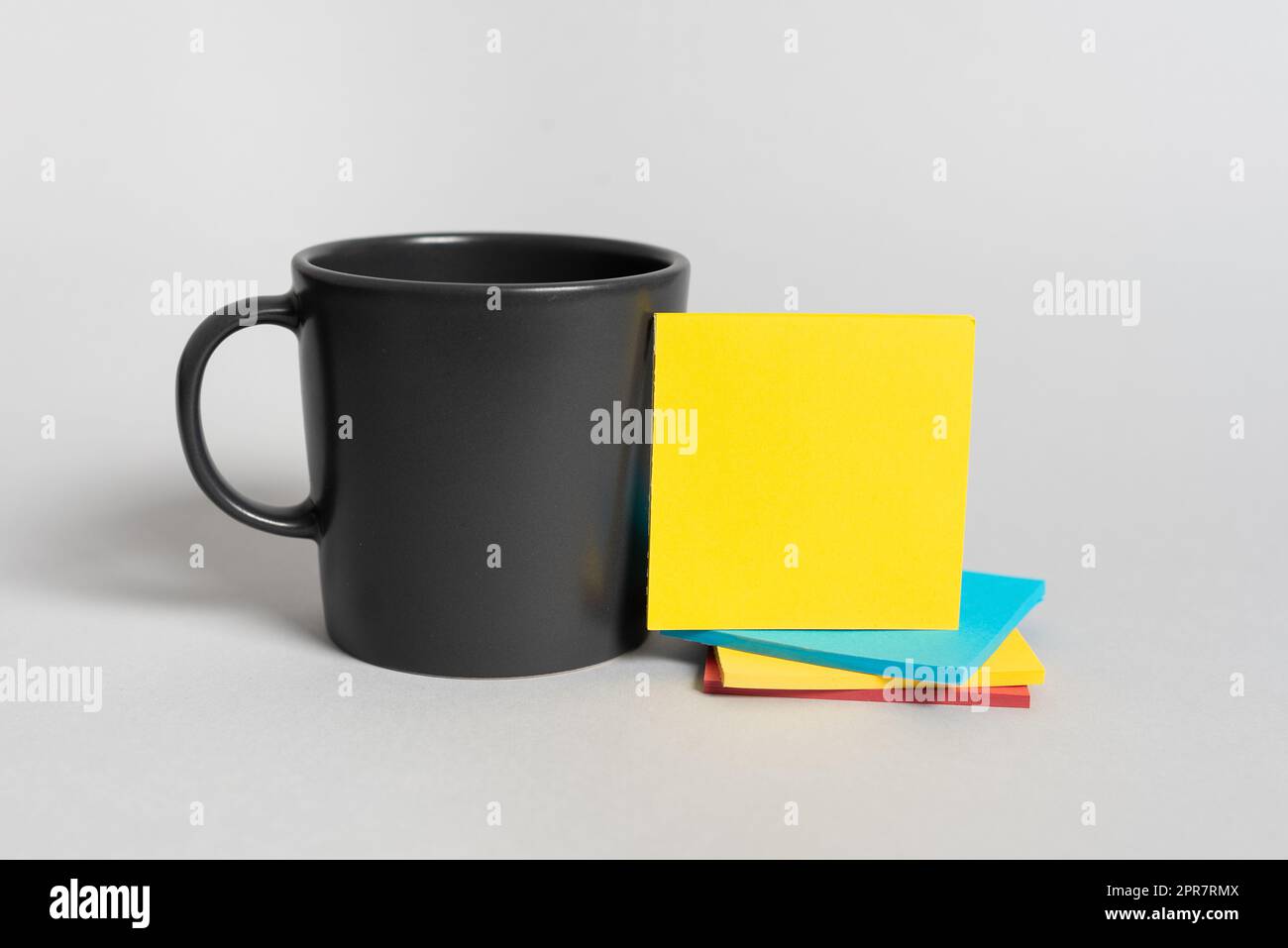 Cup And Pile Of Sticky Notes With Important Information On Desk. Mug ...