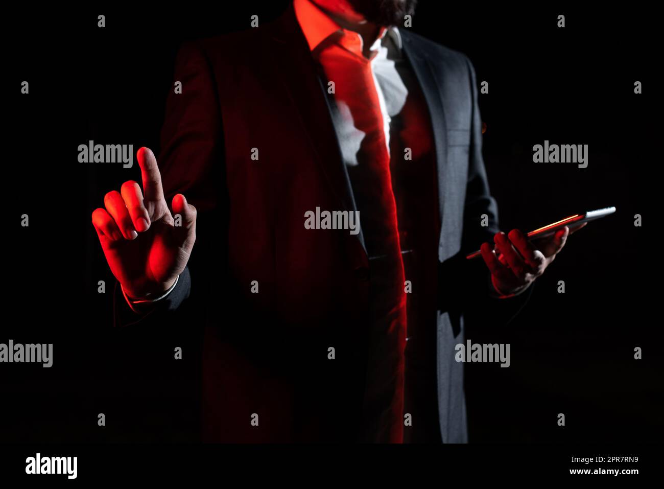 Businessman Holding Tablet And Pointing With One Finger On Important ...