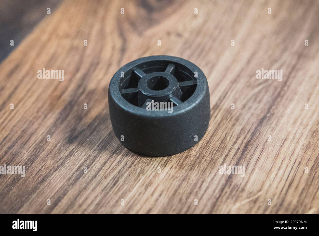 black plastic wheel which will attached to the furniture Stock Photo ...