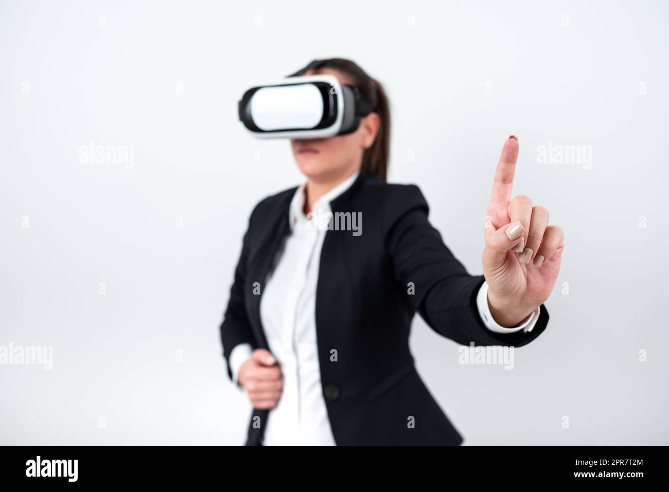 Woman Wearing Vr Glasses And Pointing On Important Messages With One ...