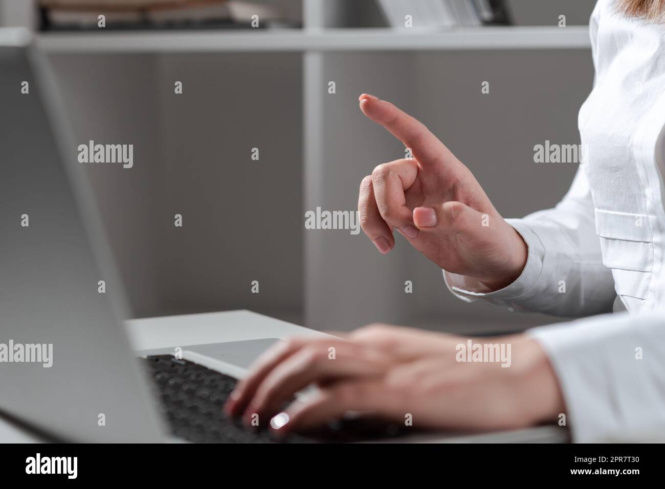 Businesswoman Typing Recent Updates On Lap Top Keyboard On Desk And ...